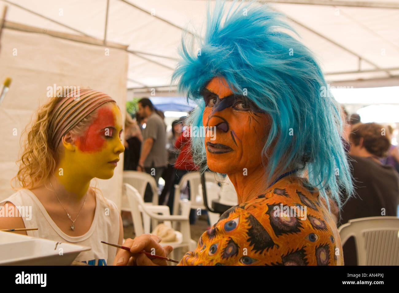 painted face painting artist Stock Photo - Alamy