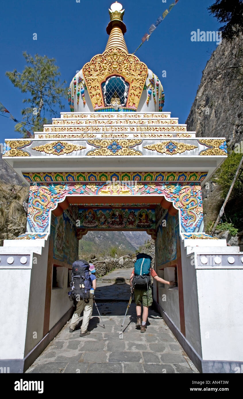Trekker walking through Changchu Chorten. Chame village. Annapurna ...