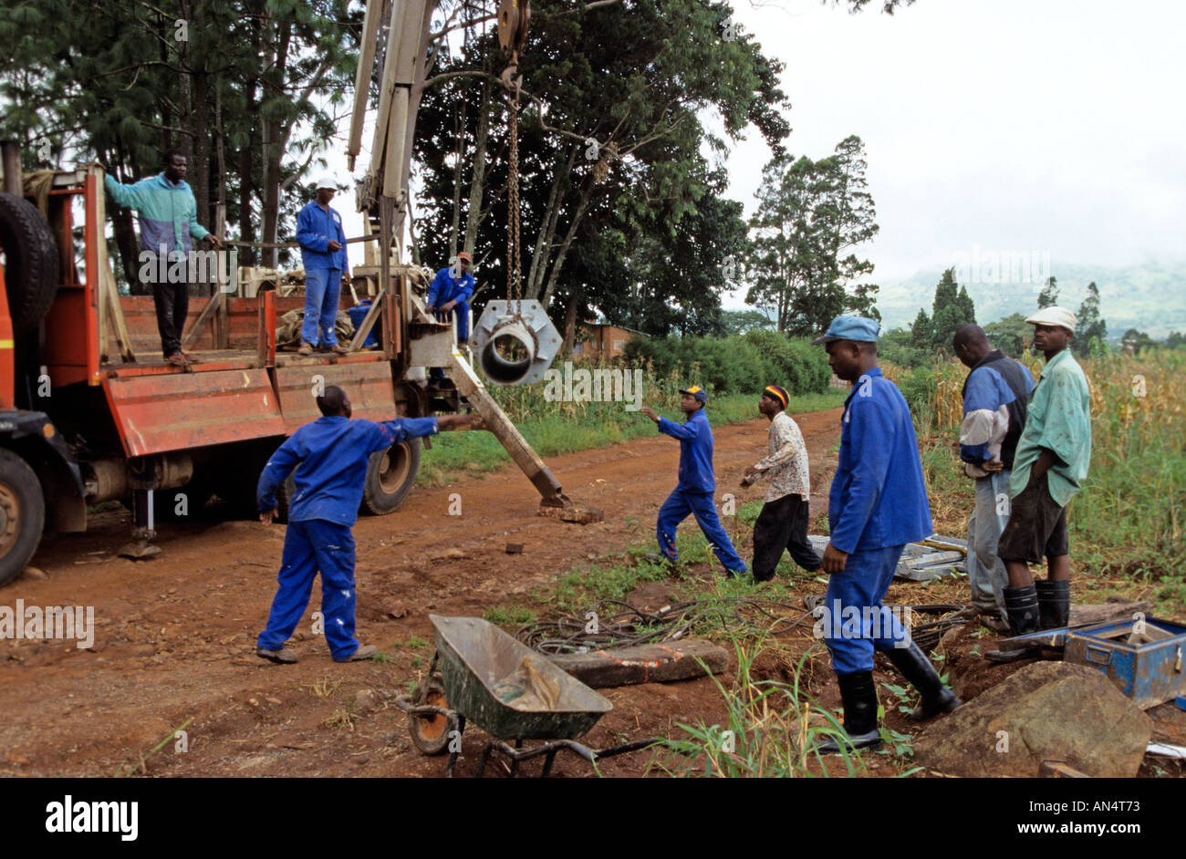 Labourers working at construction site, Africa Stock Photo - Alamy