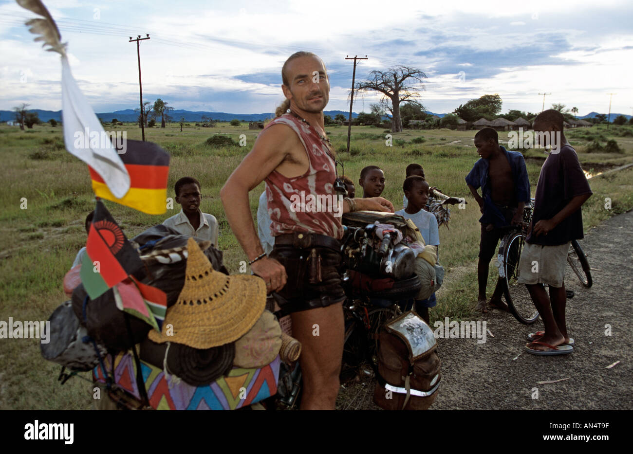 German backpacker surrounded by African boys, South Africa Stock Photo ...