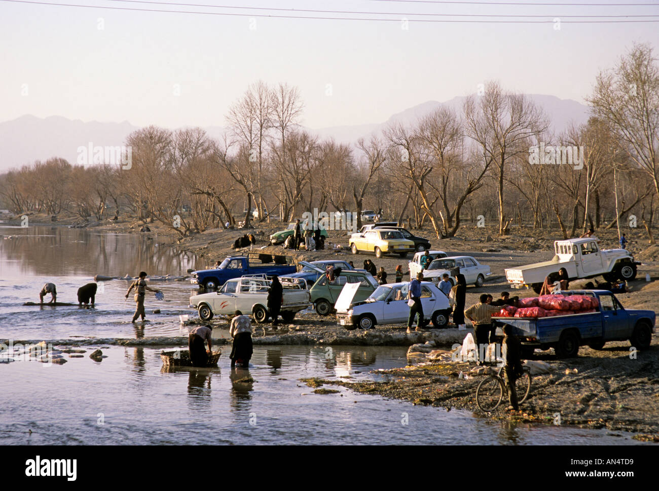 Villagers cleaning and washing in riverbank, Iran Stock Photo - Alamy