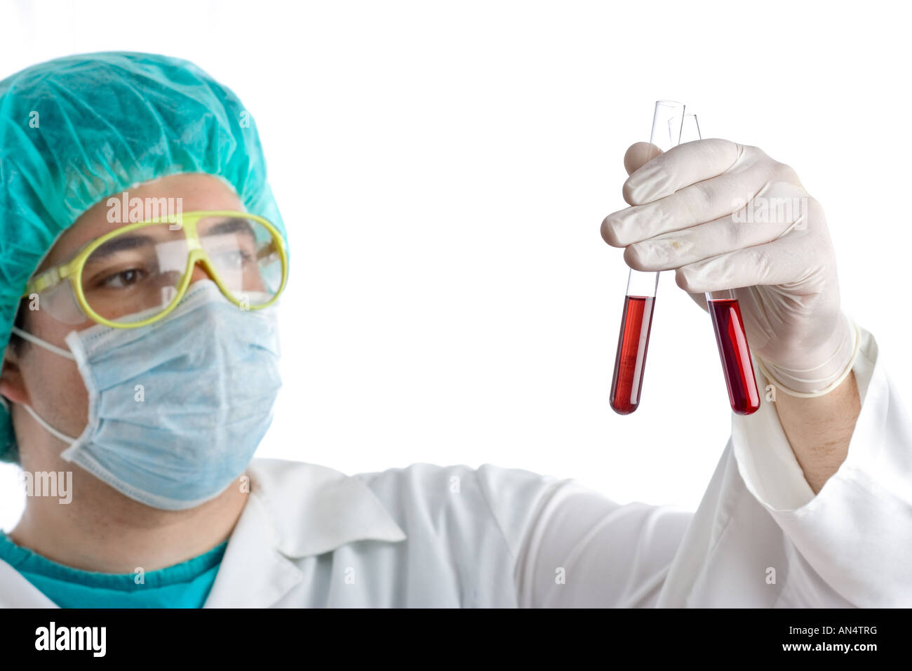 Medical technician examining blood Stock Photo - Alamy
