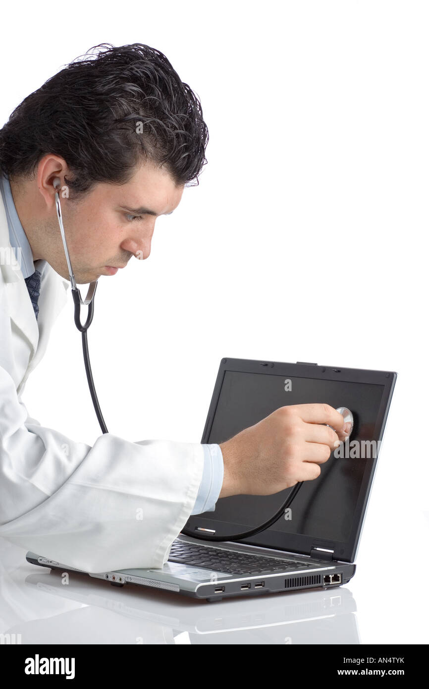 PC doctor examining a laptop computer Stock Photo - Alamy