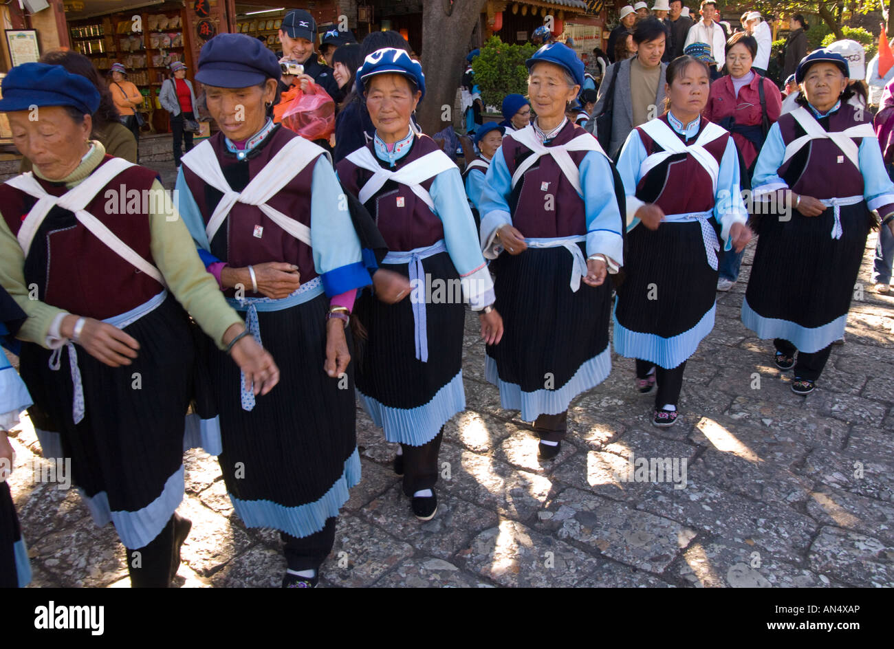 China Yunnan Lijiang Old town group of elderly women of the Naxi ethnic ...