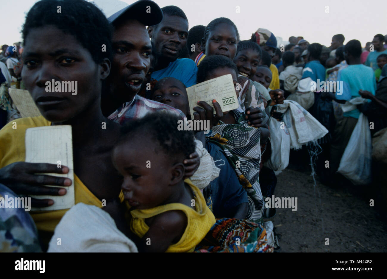 African people queuing to get help from NGO Stock Photo - Alamy