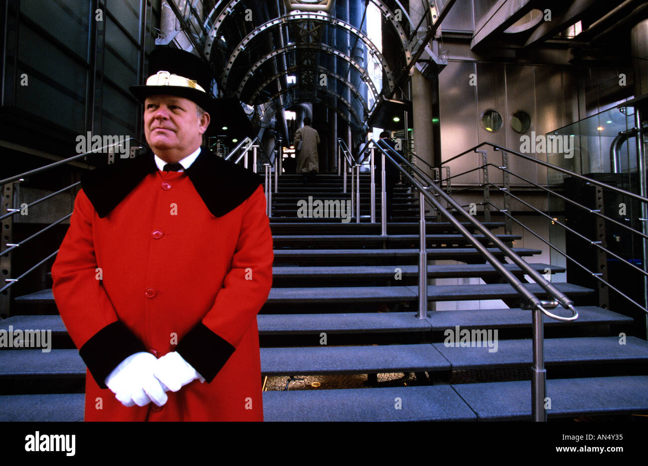 A door man guards at the entrance of Lloyds building London Stock Photo ...