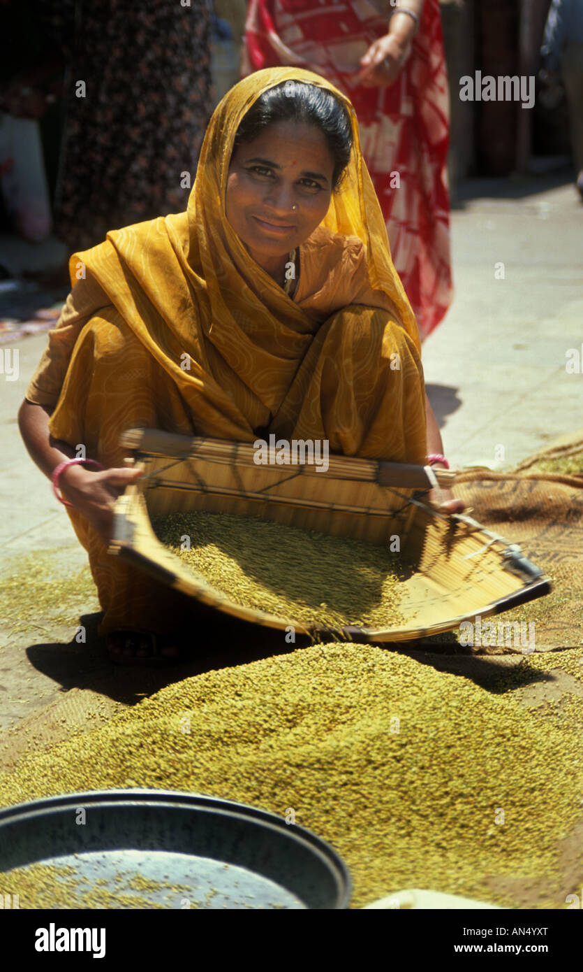 Cleaning the rice Stock Photo - Alamy