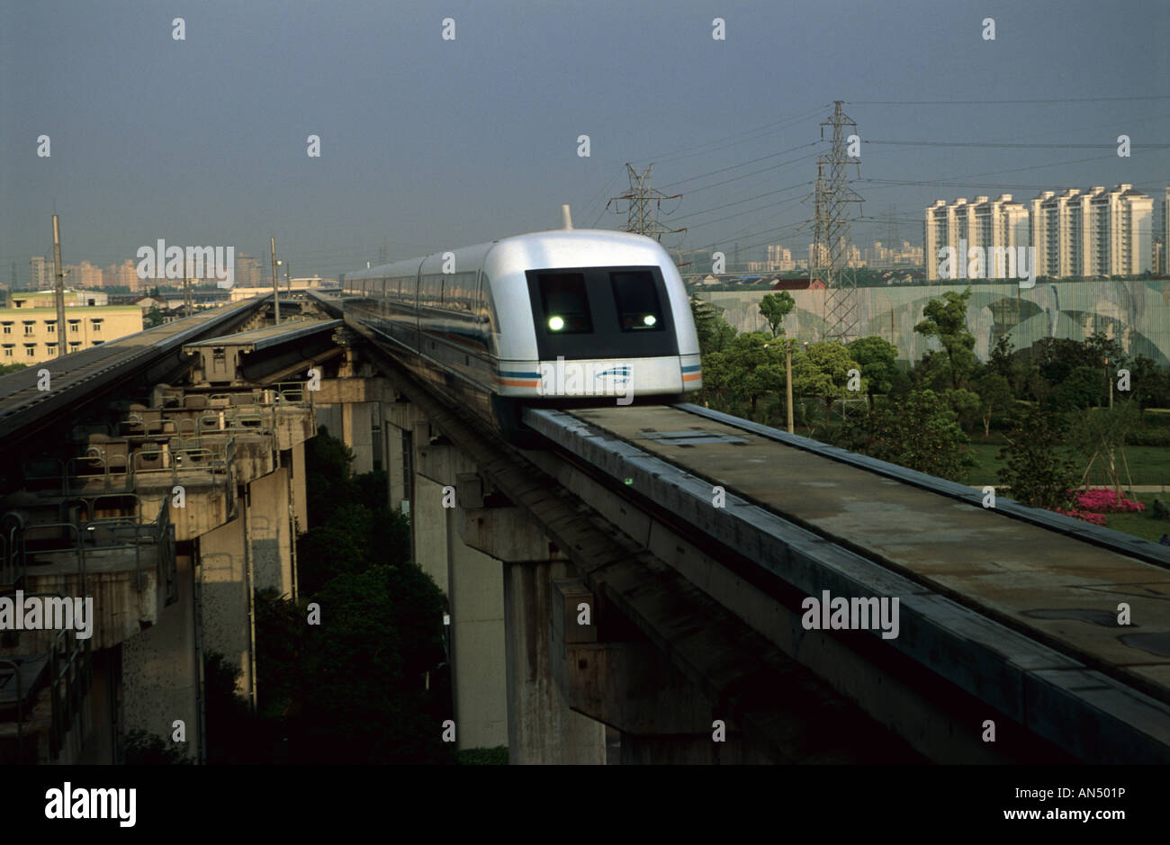 The super fast Maglev train approaches the station in Shanghai Stock ...