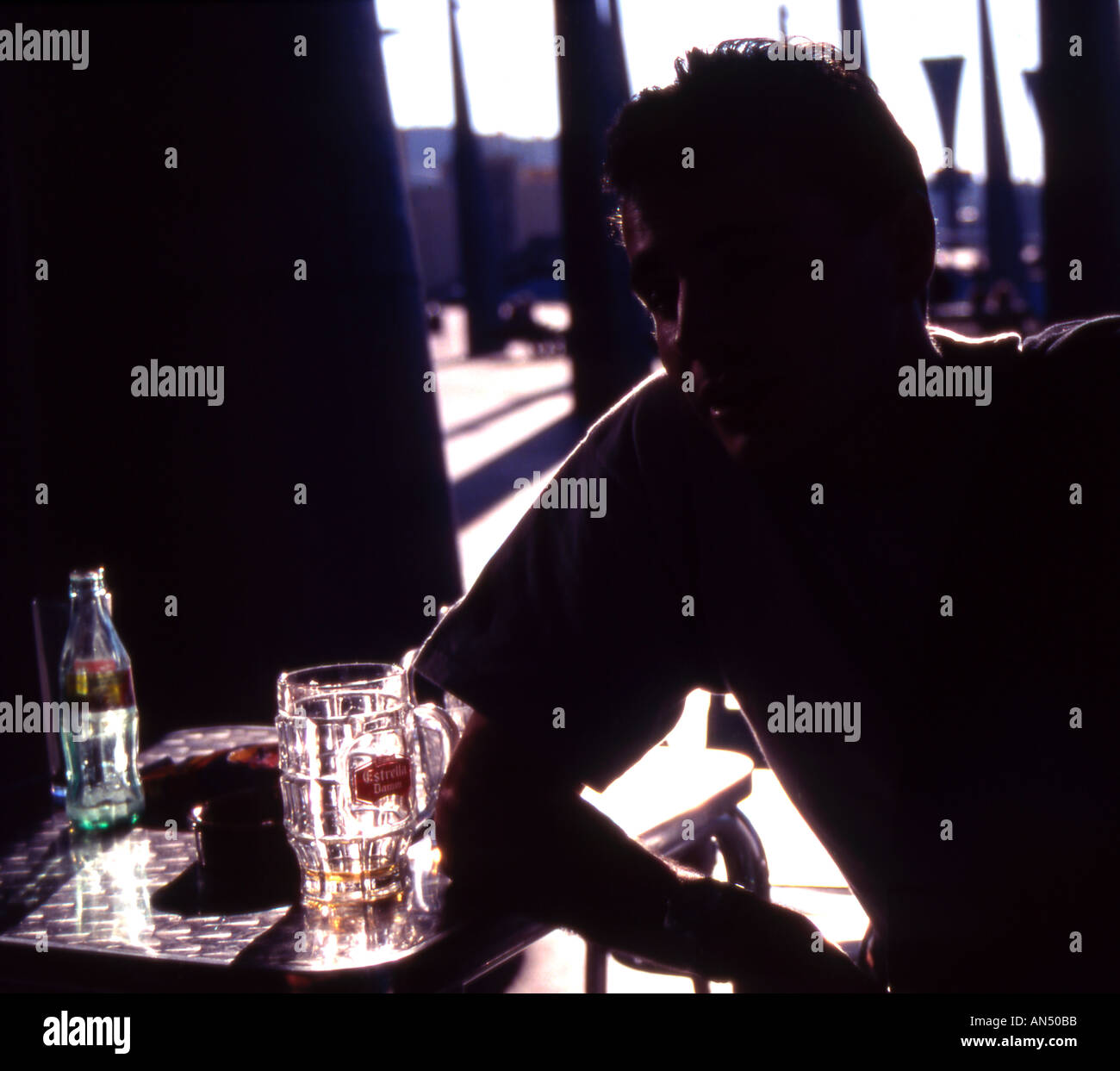Man leaning on bar backlit hi-res stock photography and images - Alamy