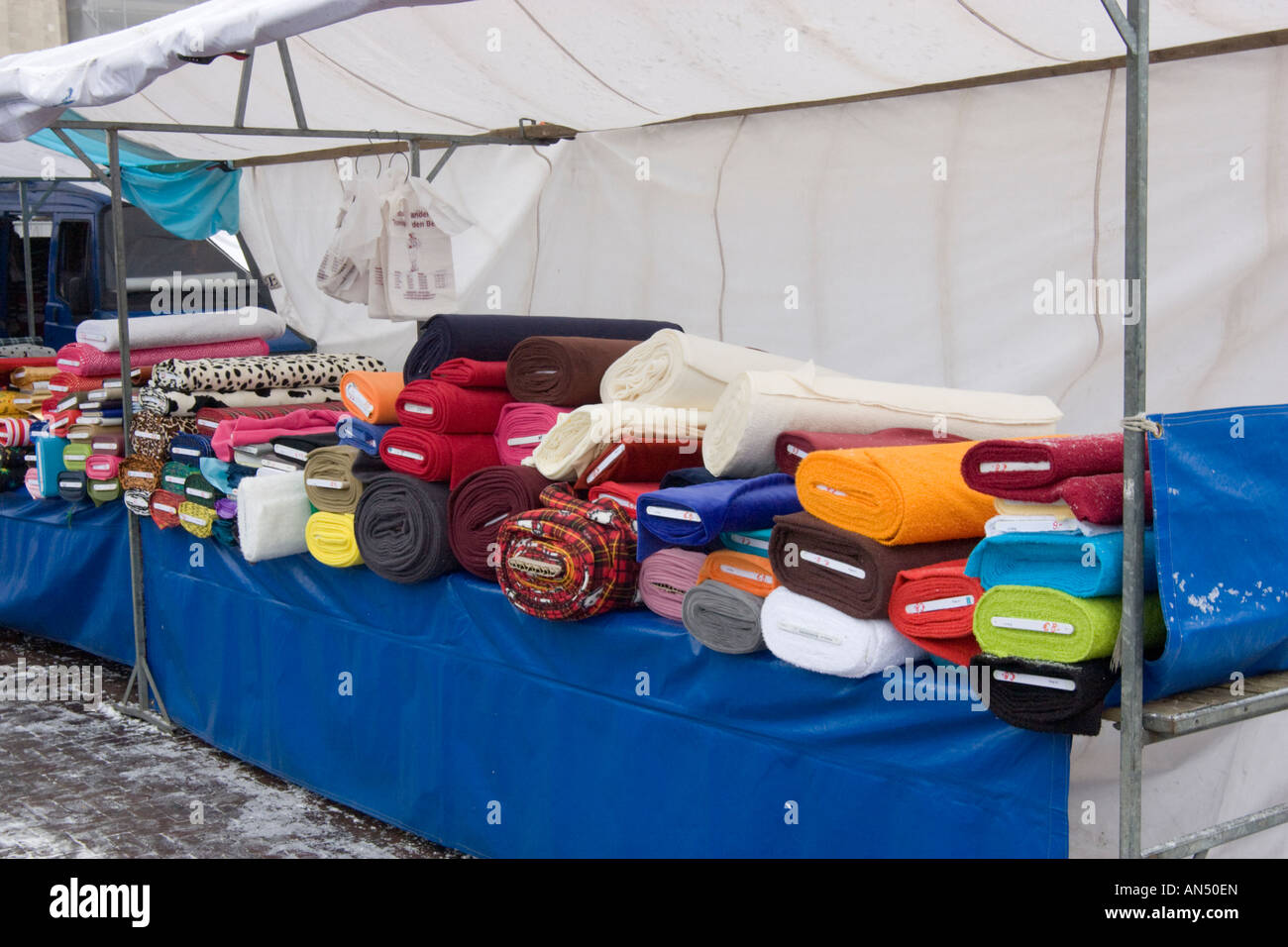 Market stall with cloth for sale Stock Photo - Alamy