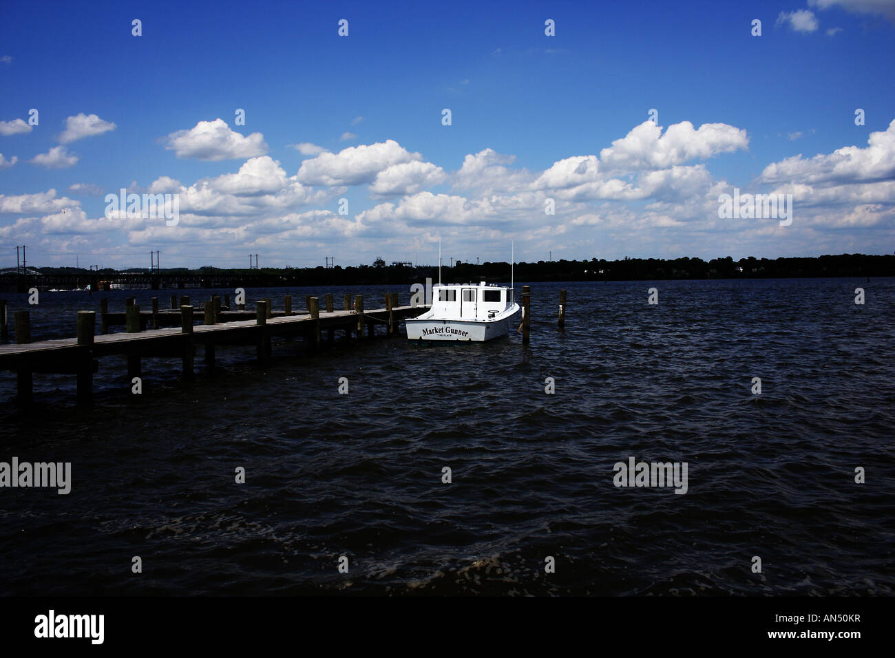 A small boat docked on the Chesapeake bay Stock Photo - Alamy