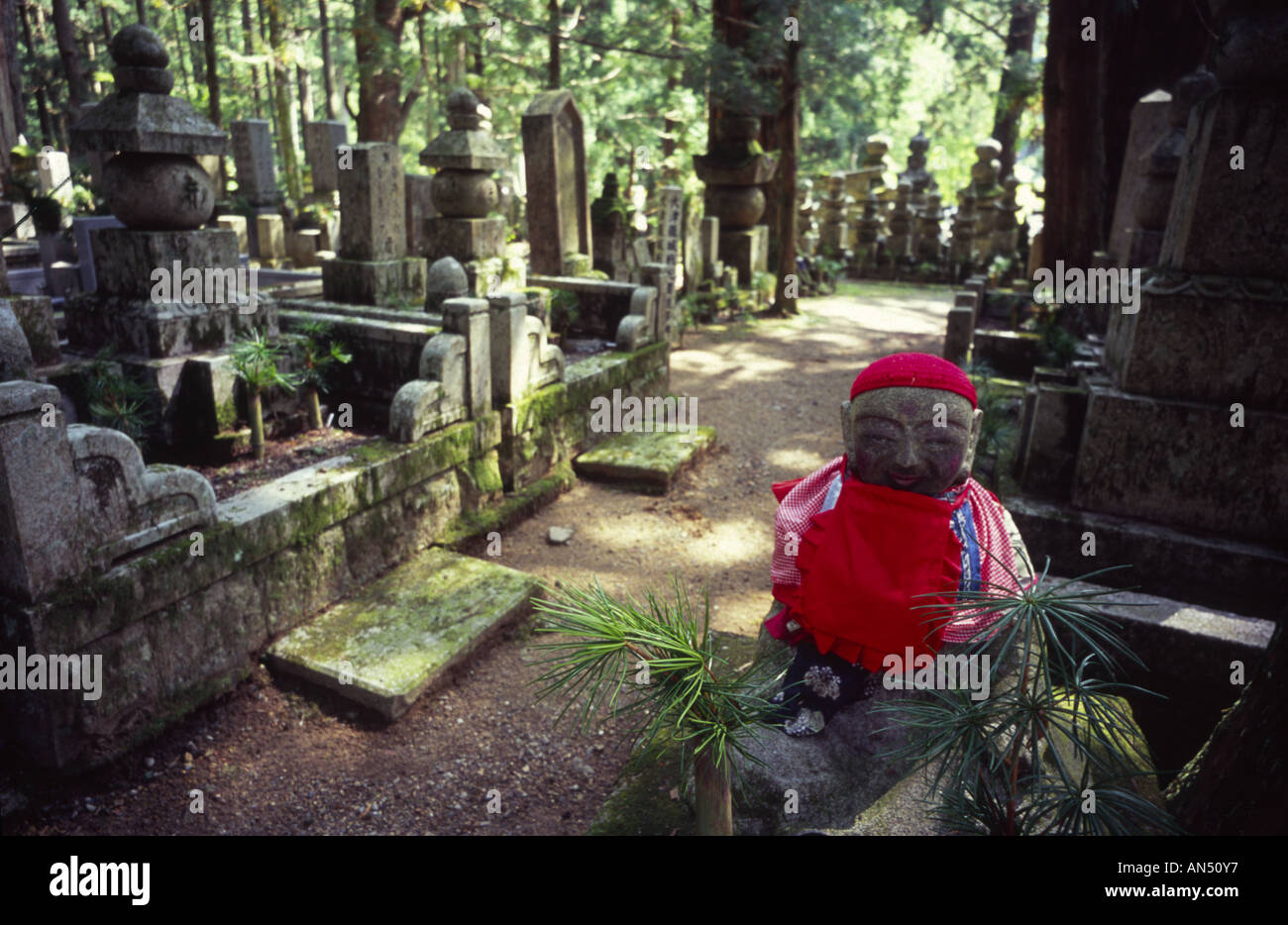 Adorned childrens tombs/statues at Okuno-in cemetery, kansai, japan ...