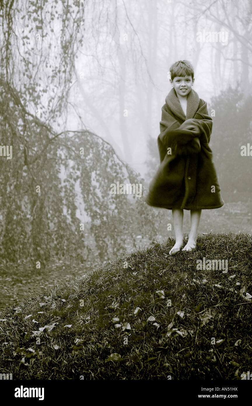 A Boy standing outside Stock Photo - Alamy