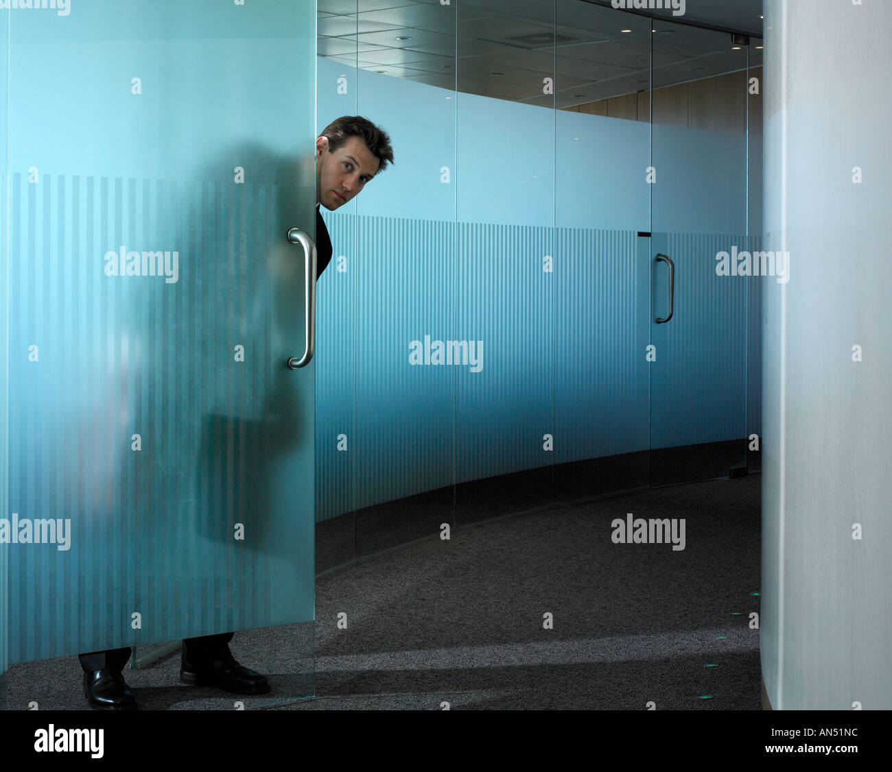 Peeking around door hi-res stock photography and images - Alamy