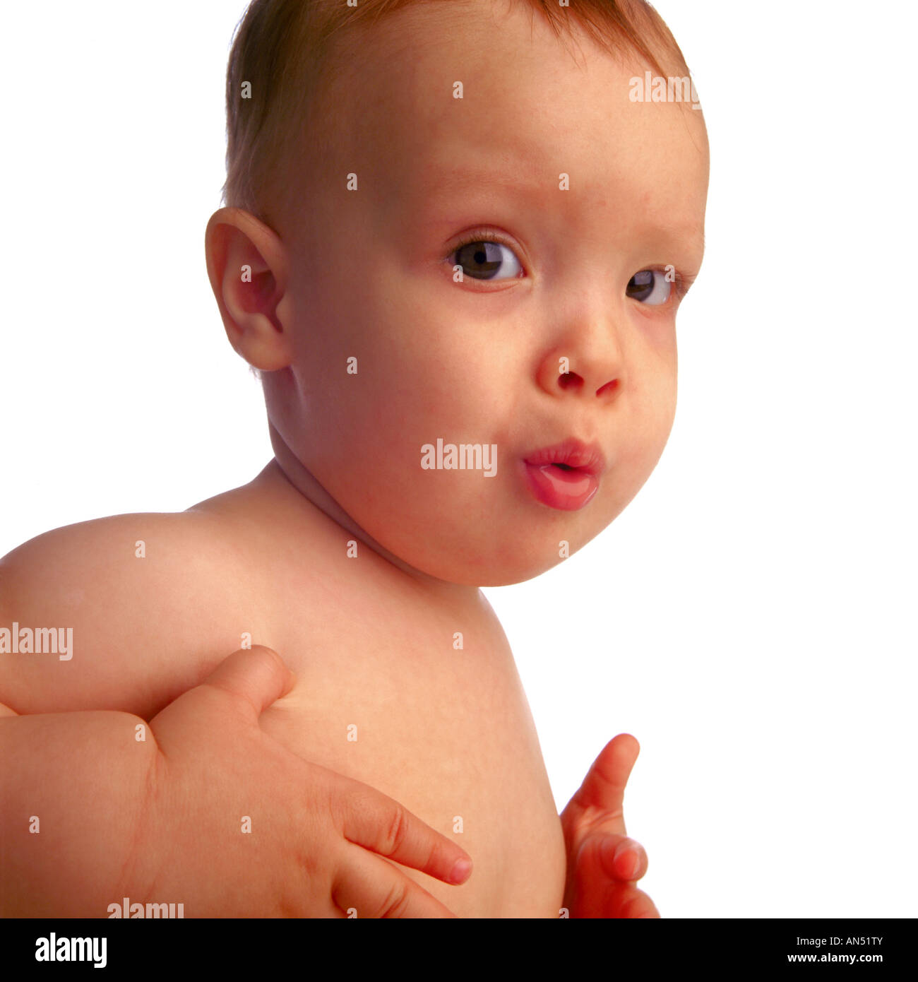 A baby making face Stock Photo - Alamy