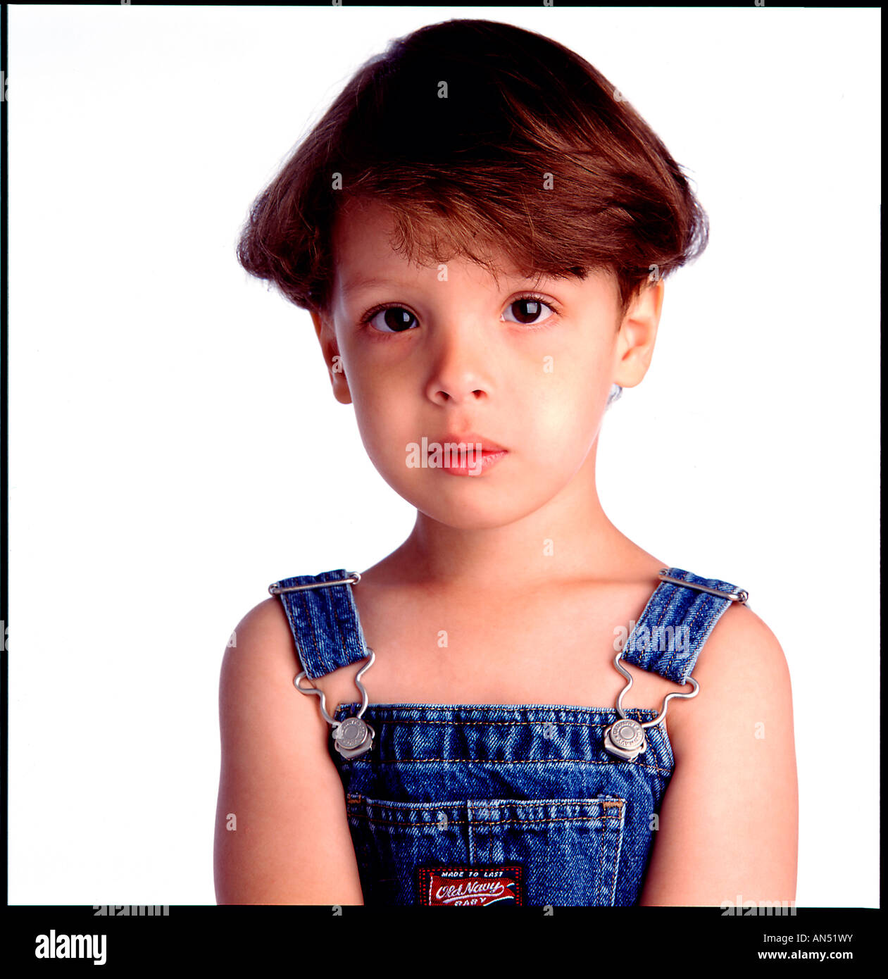 a boy in overalls Stock Photo - Alamy