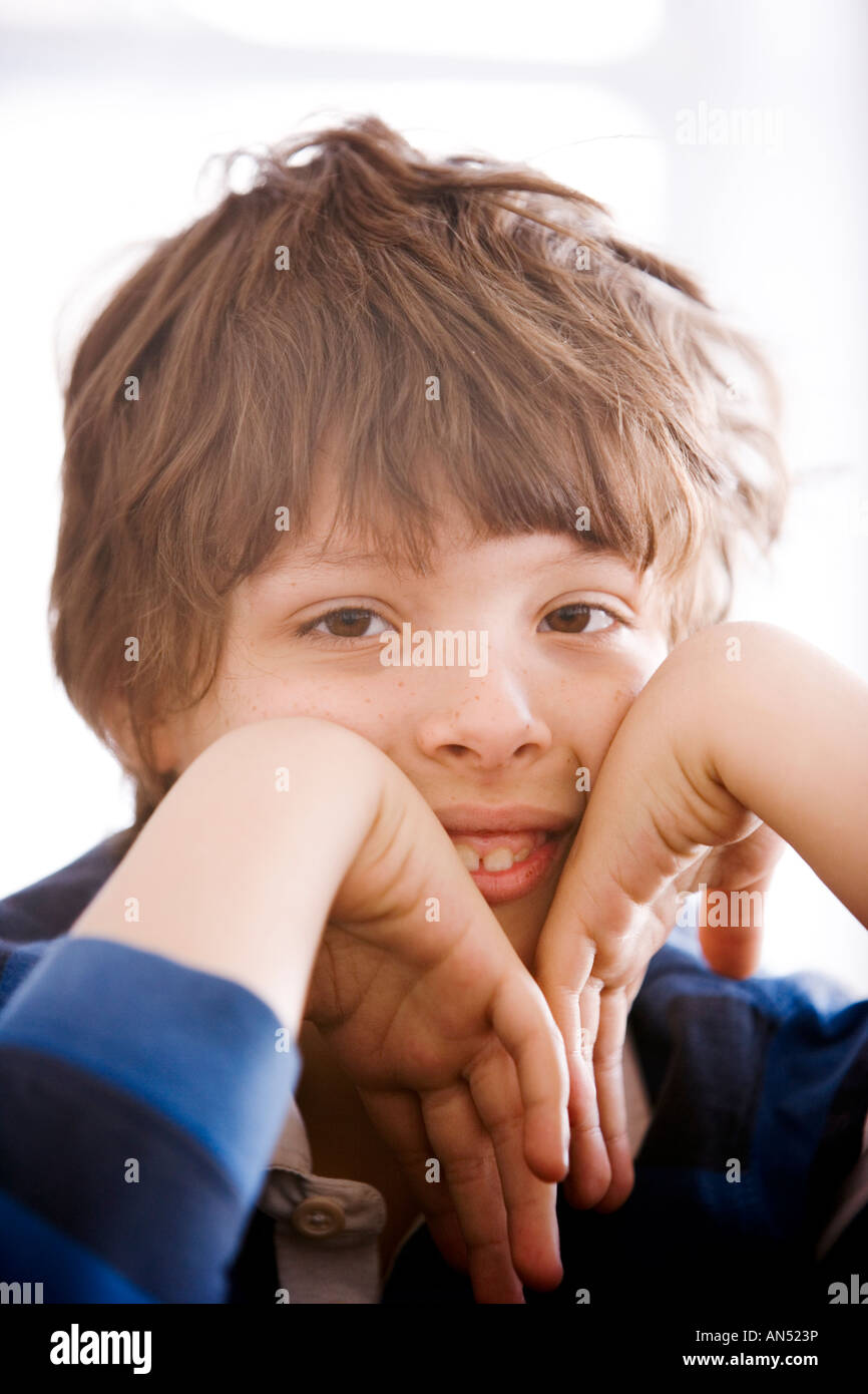 boy looking at camera indoors Stock Photo - Alamy