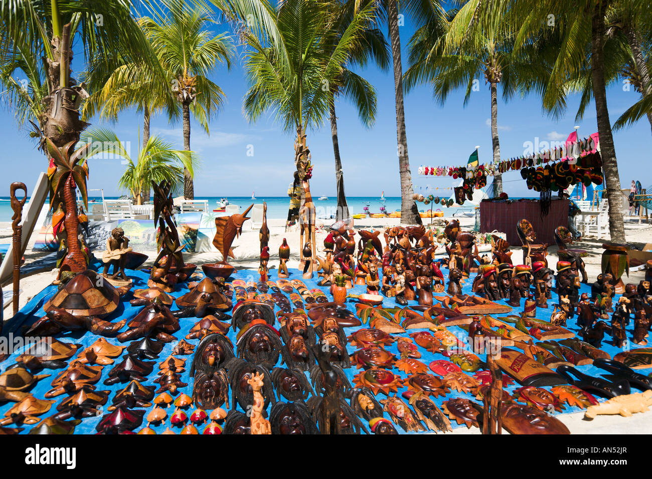 Local Craftsmen selling carvings at Couples Swept Away Resort, Seven ...