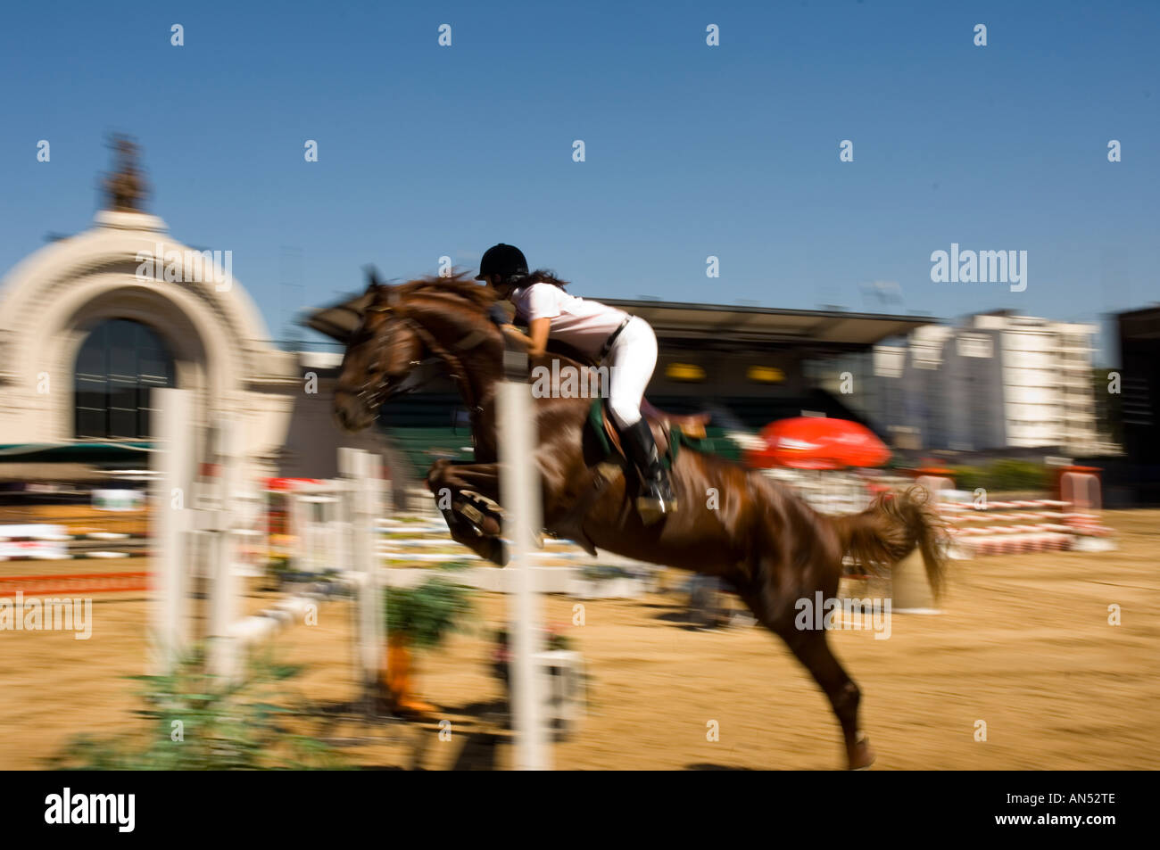 rider jumping obstacle Stock Photo - Alamy