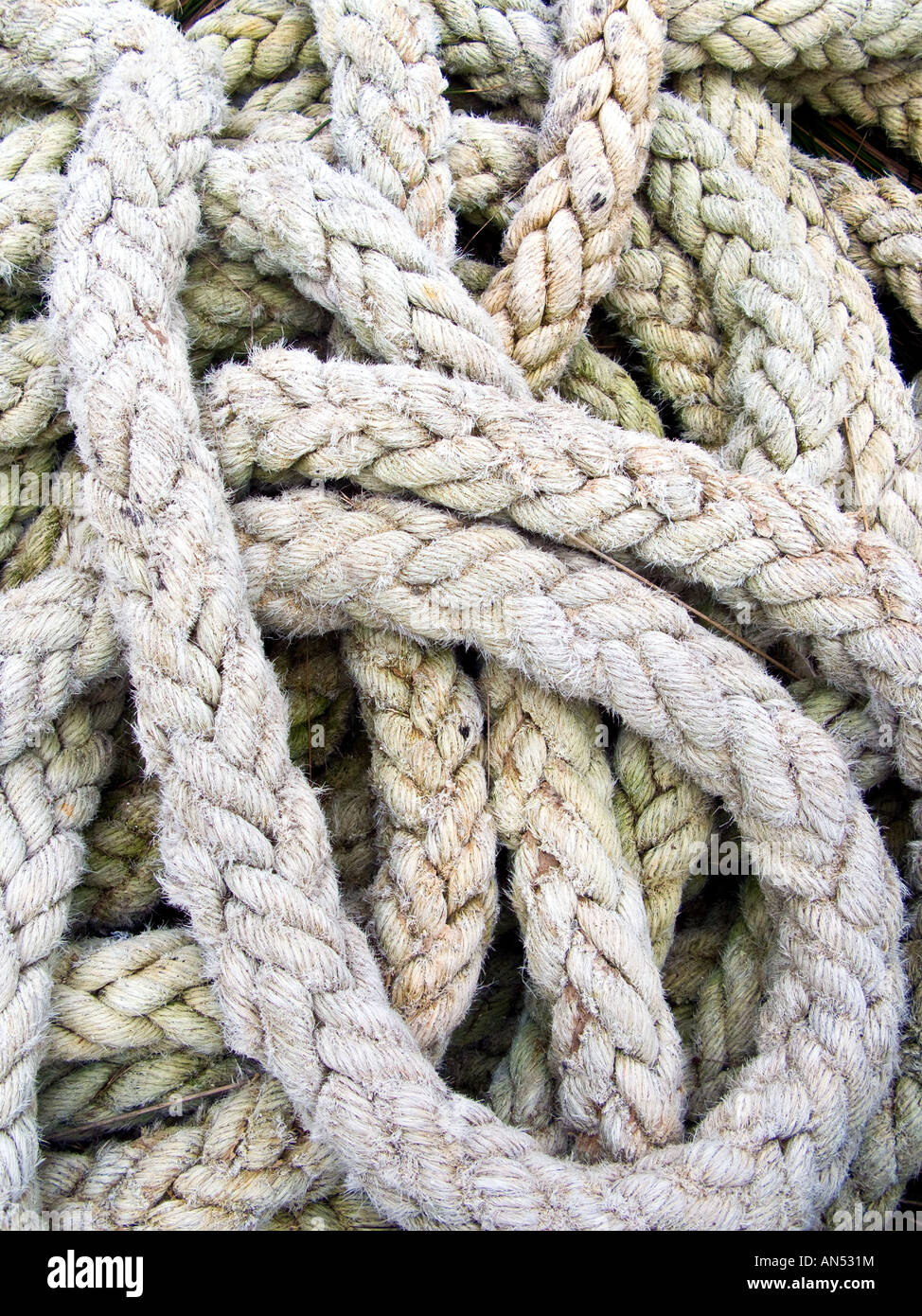 pile of used and old thick ship ropes Stock Photo - Alamy
