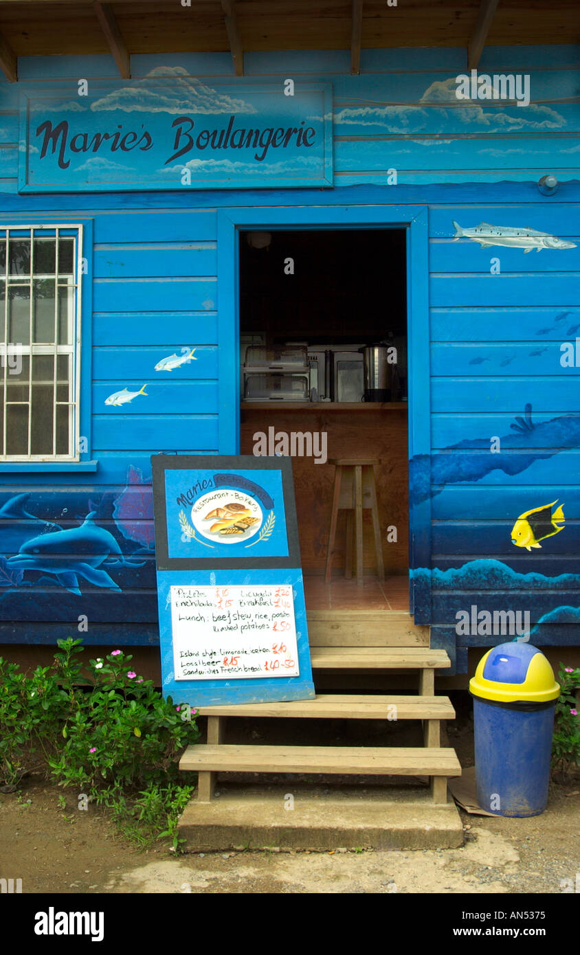 A seafood restaurant exterior displays menu in Roatan Honduras Stock ...