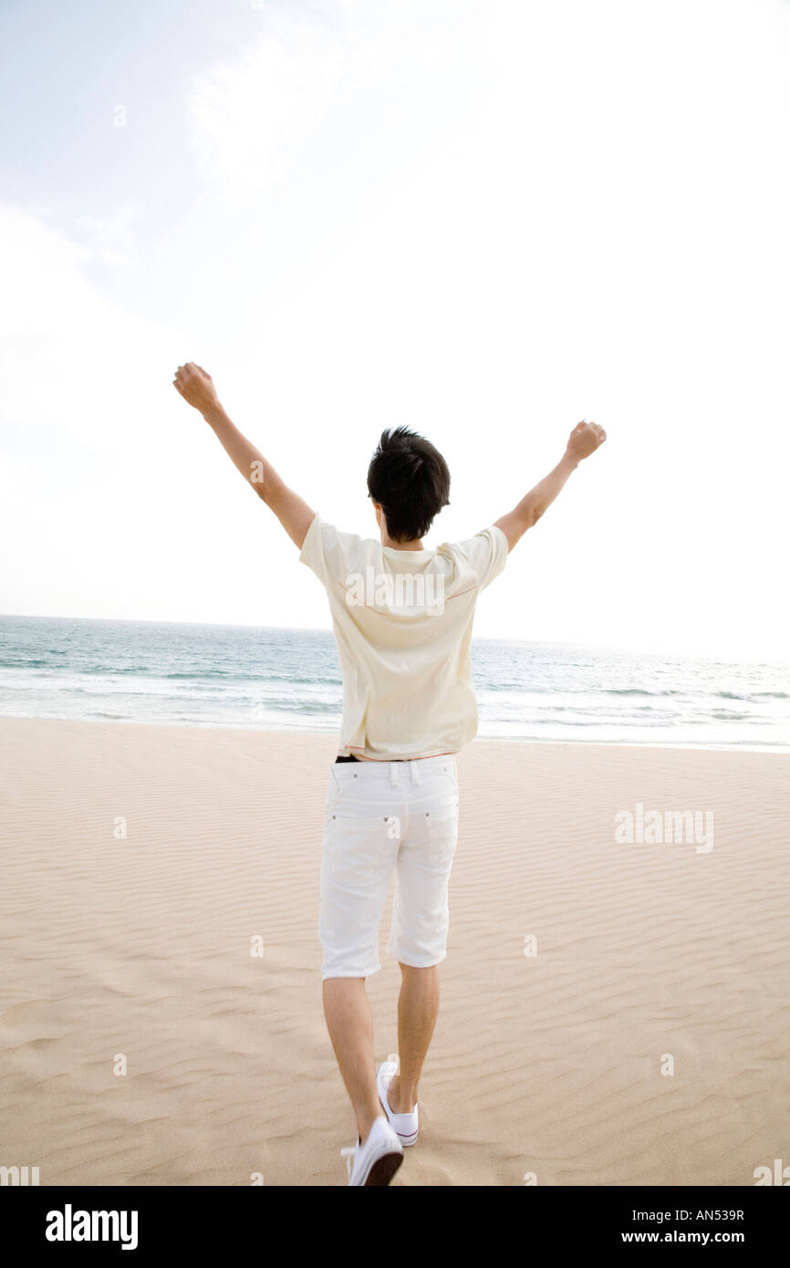Back figure of Japanese man Stock Photo - Alamy