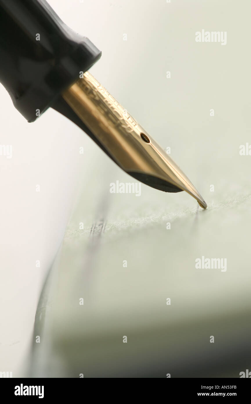 Signing with a fountain pen Stock Photo - Alamy