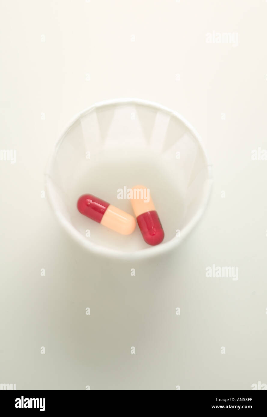 Medication capsules in a cup hi-res stock photography and images - Alamy