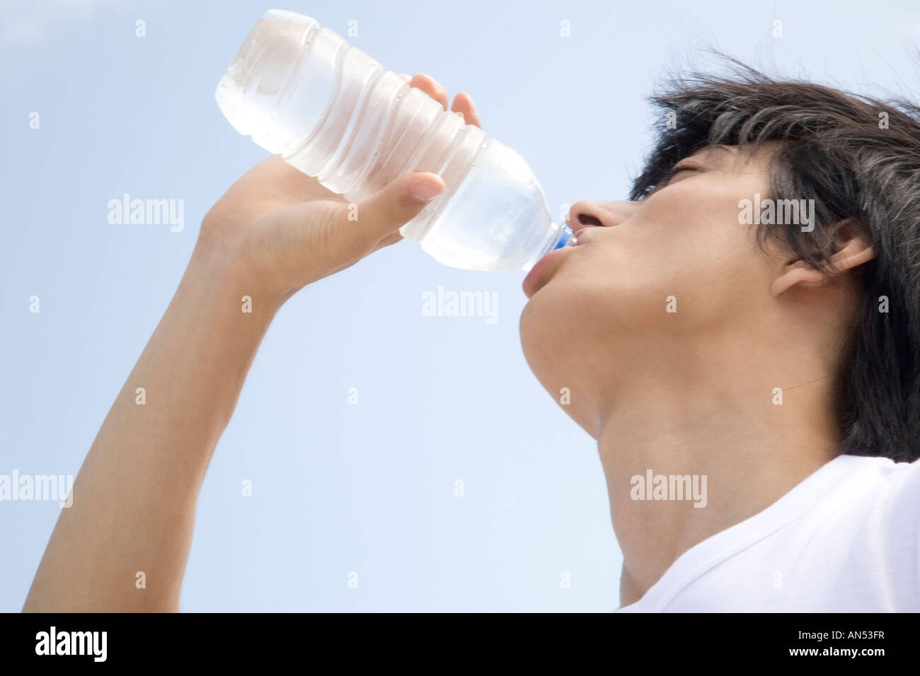 Japanese man drinking a water Stock Photo - Alamy