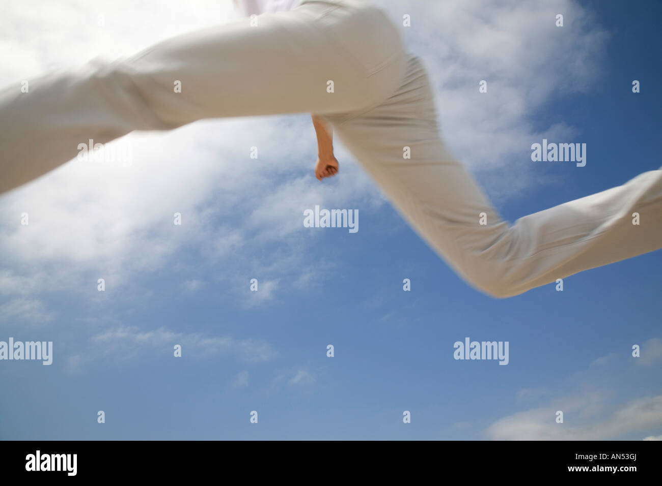 Jumping Japanese man Stock Photo - Alamy