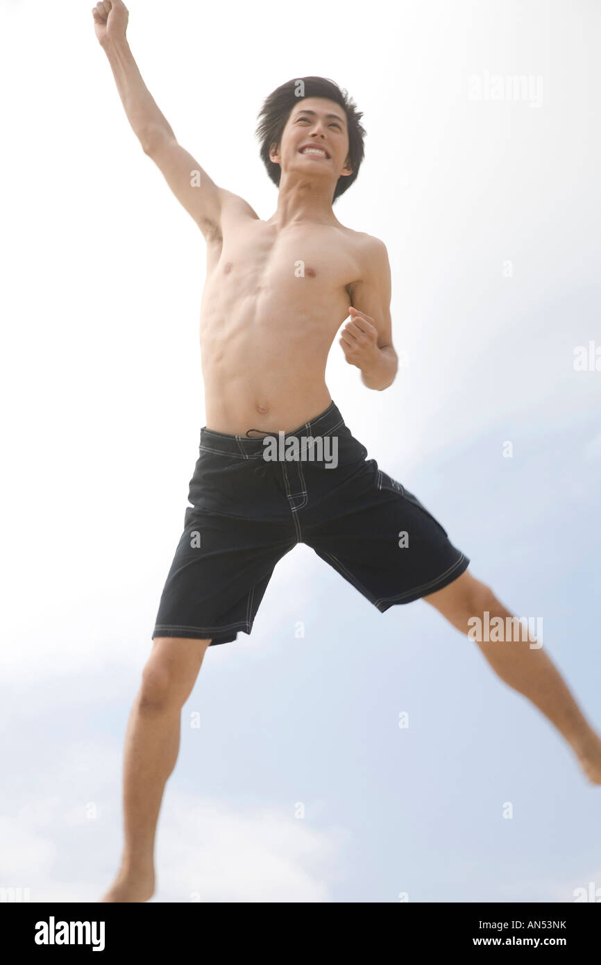 Japanese man jumping Stock Photo - Alamy