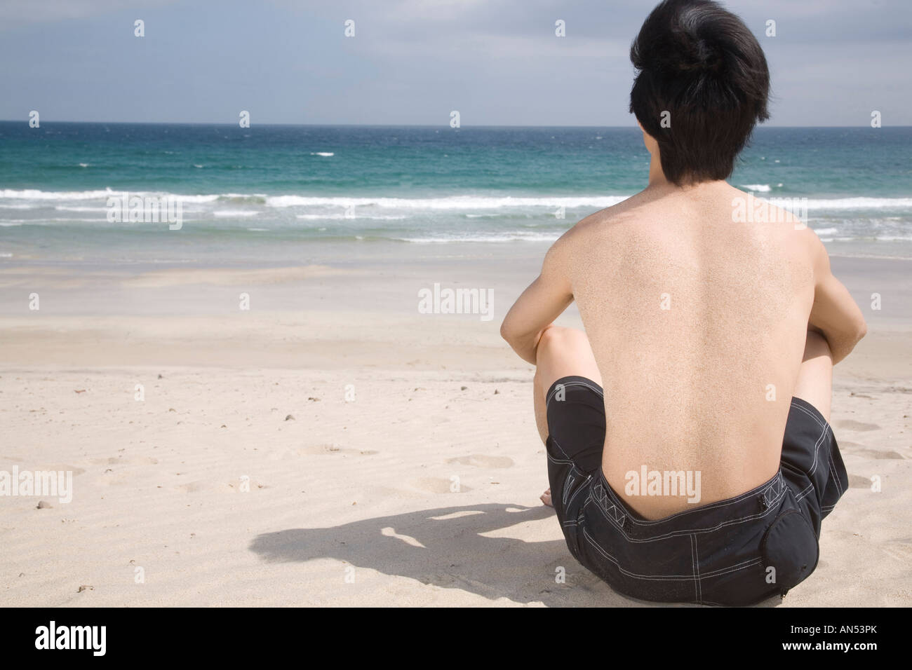 Back figure of Japanese man Stock Photo - Alamy