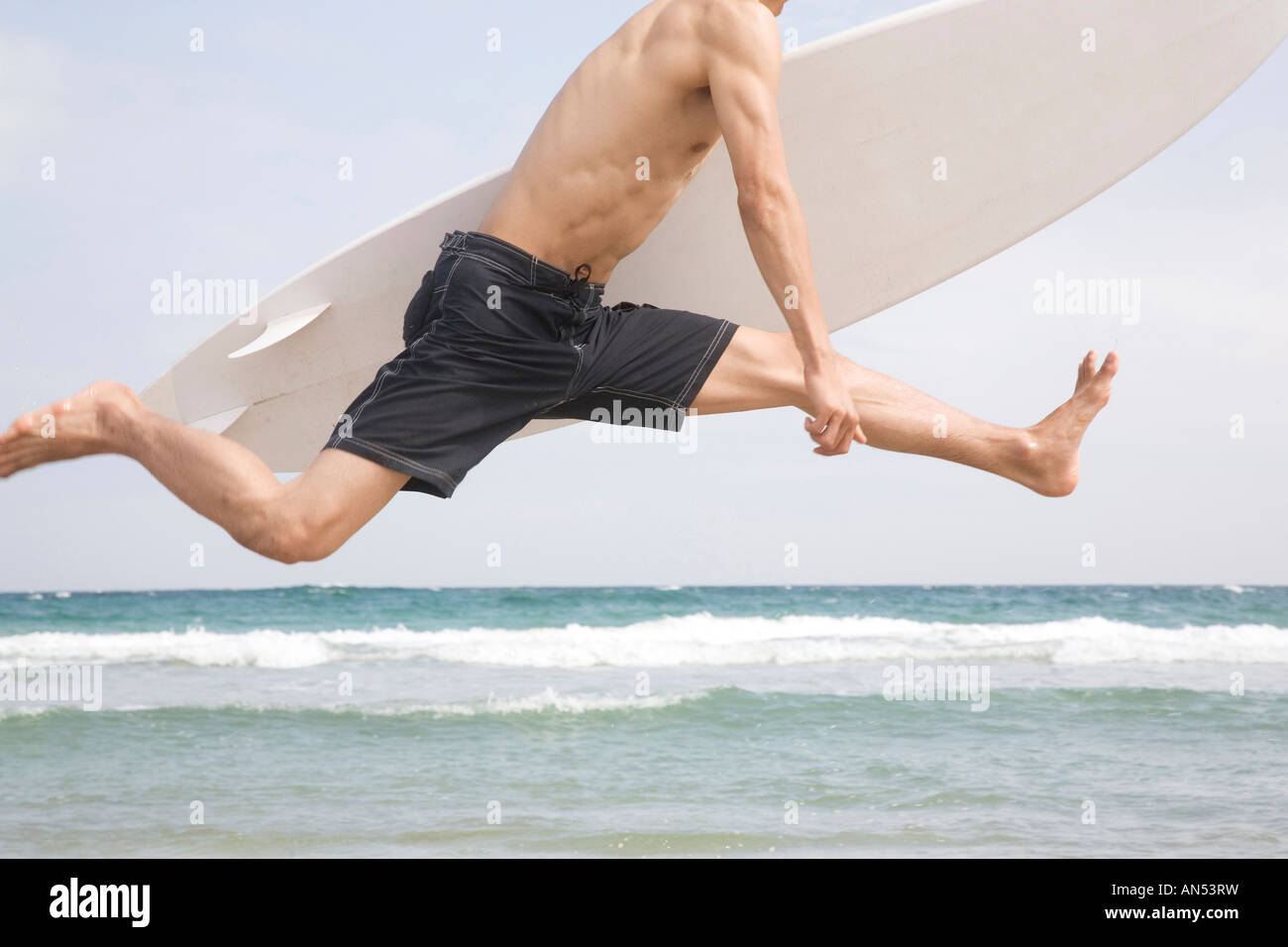 Japanese man jumping Stock Photo - Alamy