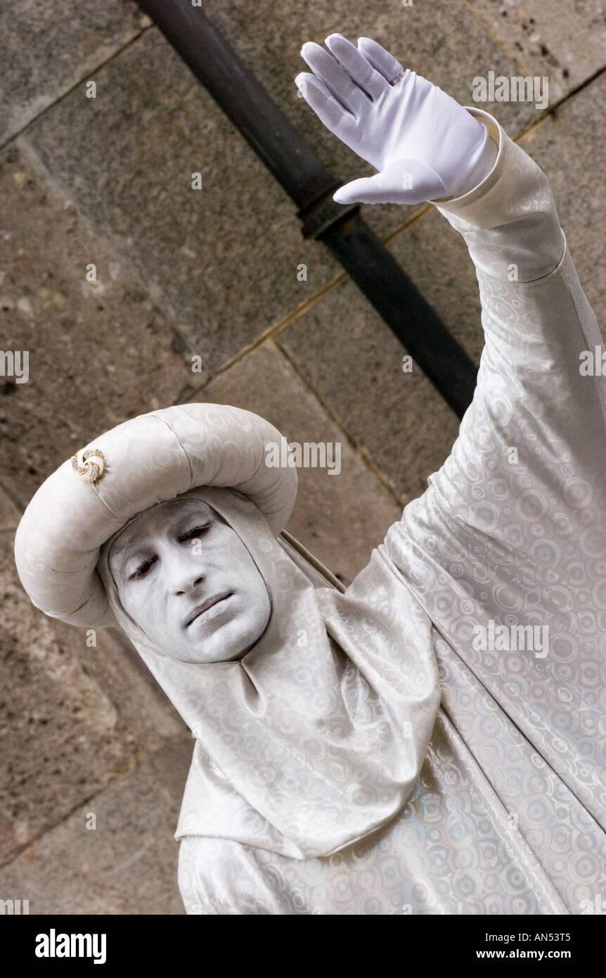 young mimic raising hand Stock Photo - Alamy