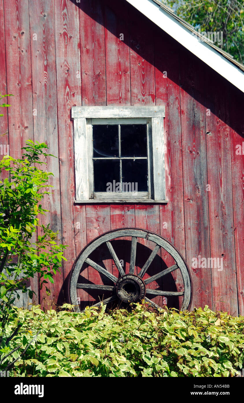 Windows and old wagon wheel in a historical setting at the Mennonite ...