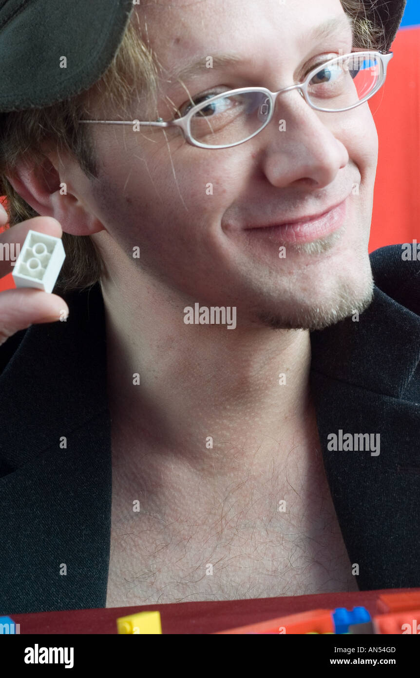 man playing with lego Stock Photo - Alamy