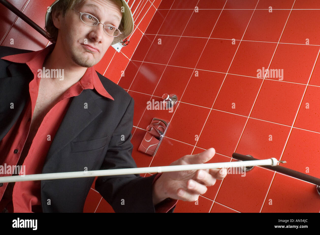man in suite in bathroom Stock Photo - Alamy