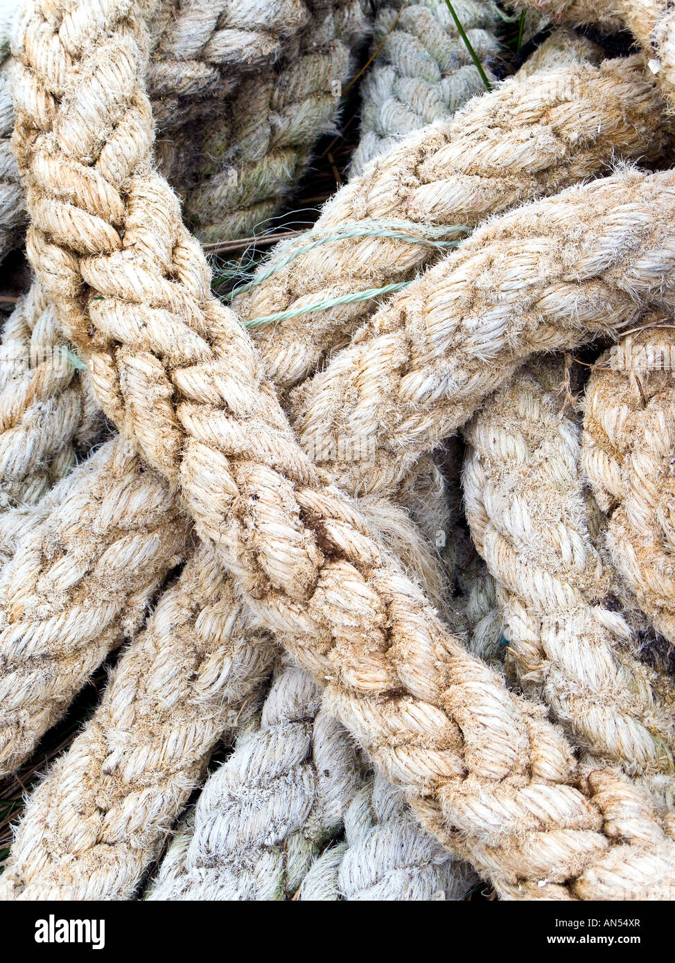 pile of used and old thick ship ropes Stock Photo - Alamy
