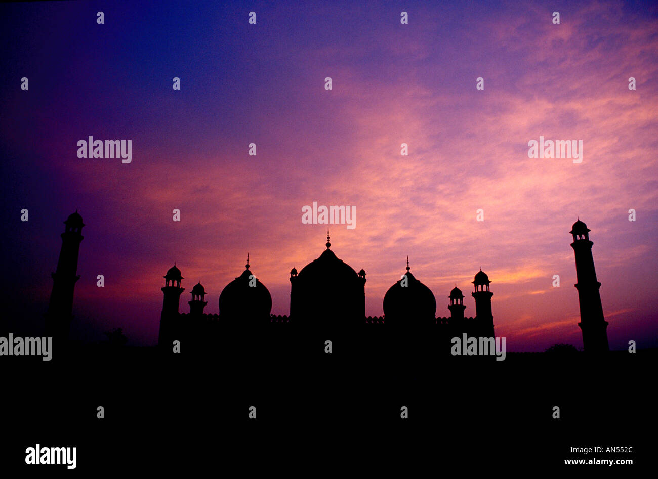 At sunset a silhouette of the Badshahi Mosque in Lahore Pakistan Stock ...