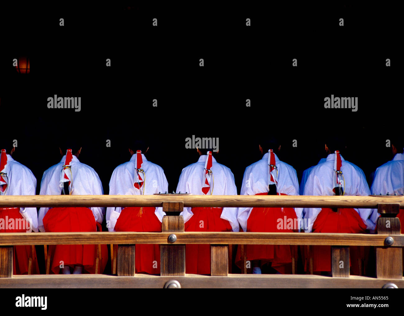 Miko in their ceremonial dress assist the Shinto priests with ...