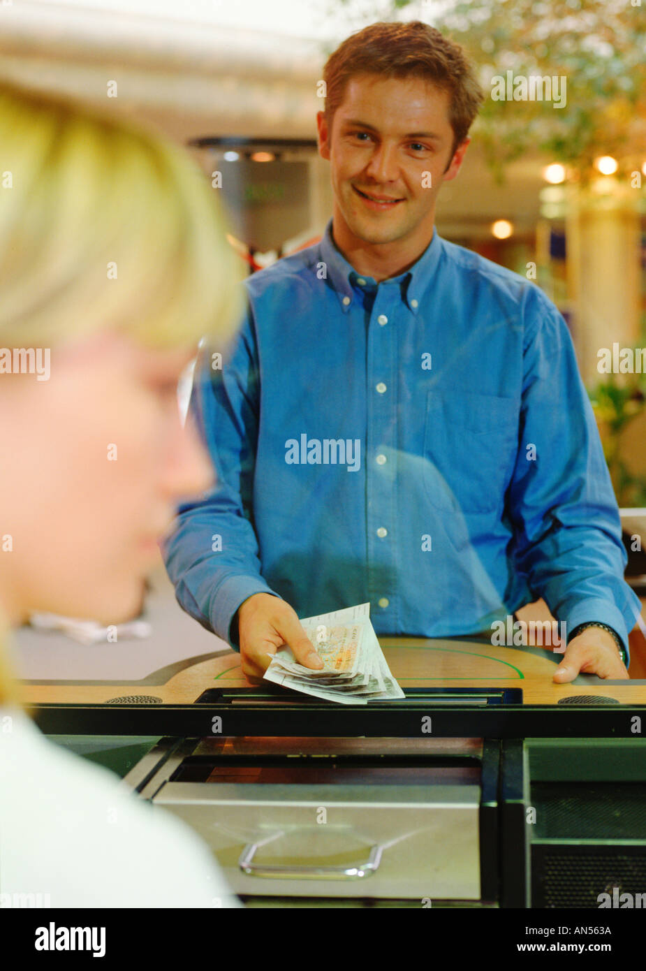 Bank clerk hi-res stock photography and images - Alamy