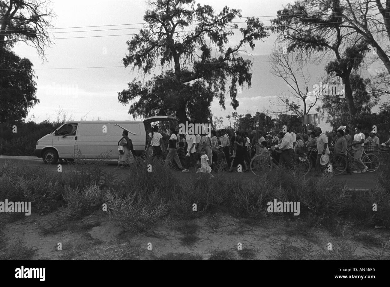 Townspeople accompany the body of Lilia Machorro on the highway leading ...