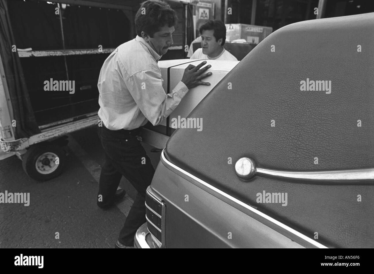 Olimpia Funeral Home employee Oscar Cedillo during a body pick up in ...