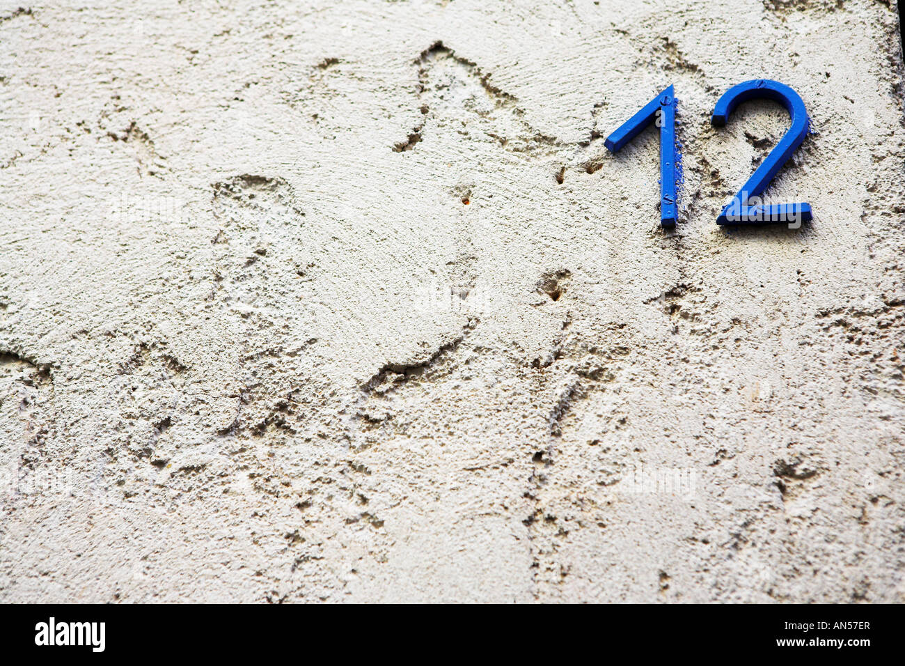 Wall with a house number on it Copy space Stock Photo - Alamy