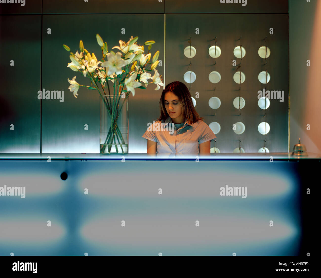 Employee at the reception desk of the hotel habita in Mexico City Stock ...