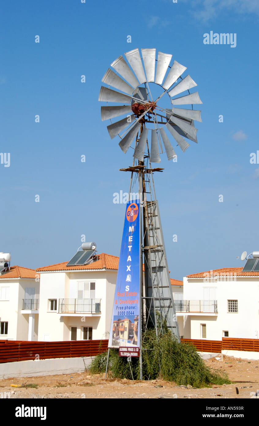Houses under construction at Pernera Cyprus EU with windmill waterpump ...