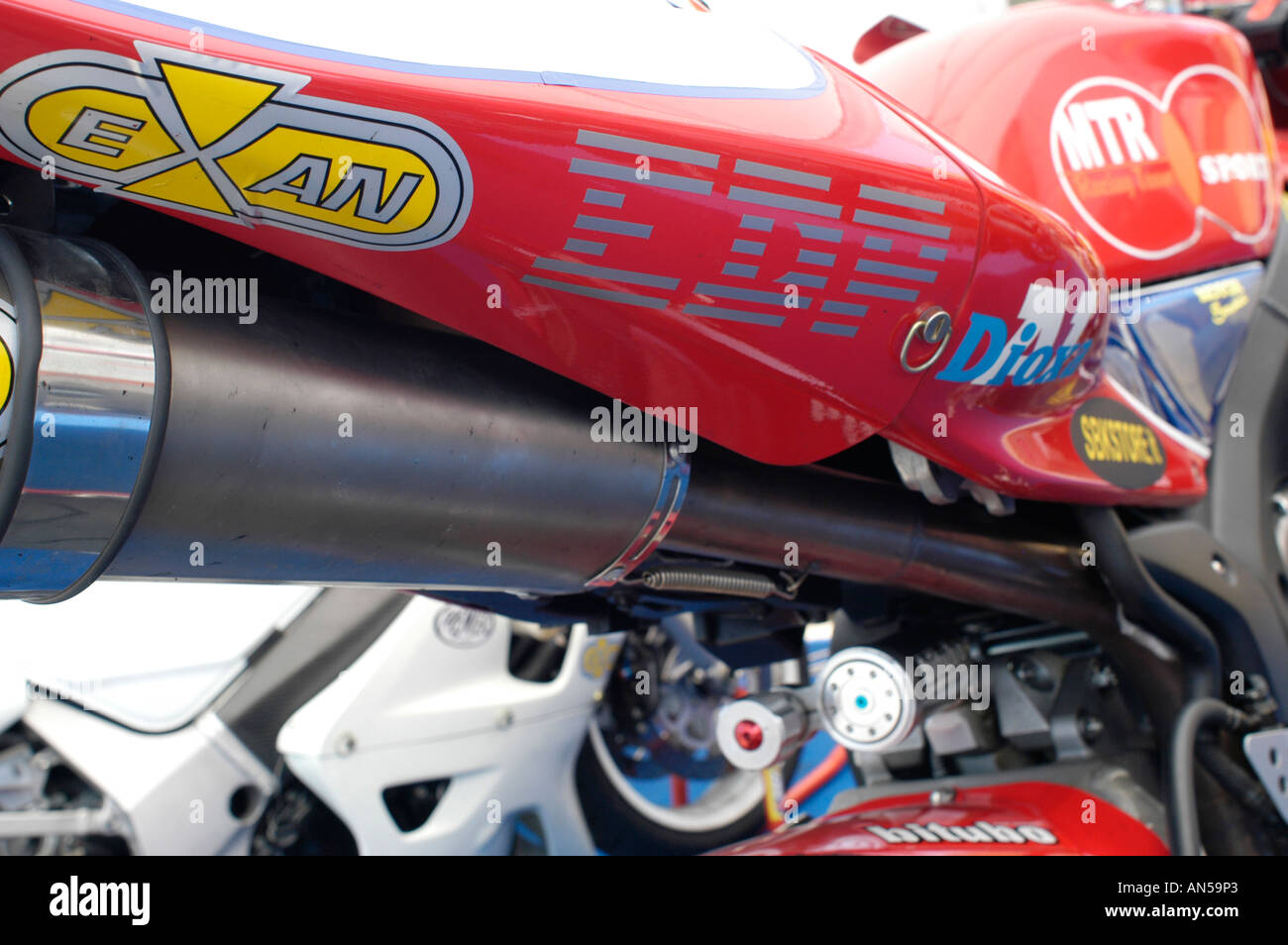 exhaust from behind of racing bike Stock Photo - Alamy