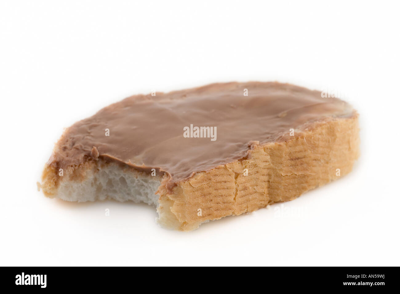 Bitten slice of bread Stock Photo - Alamy