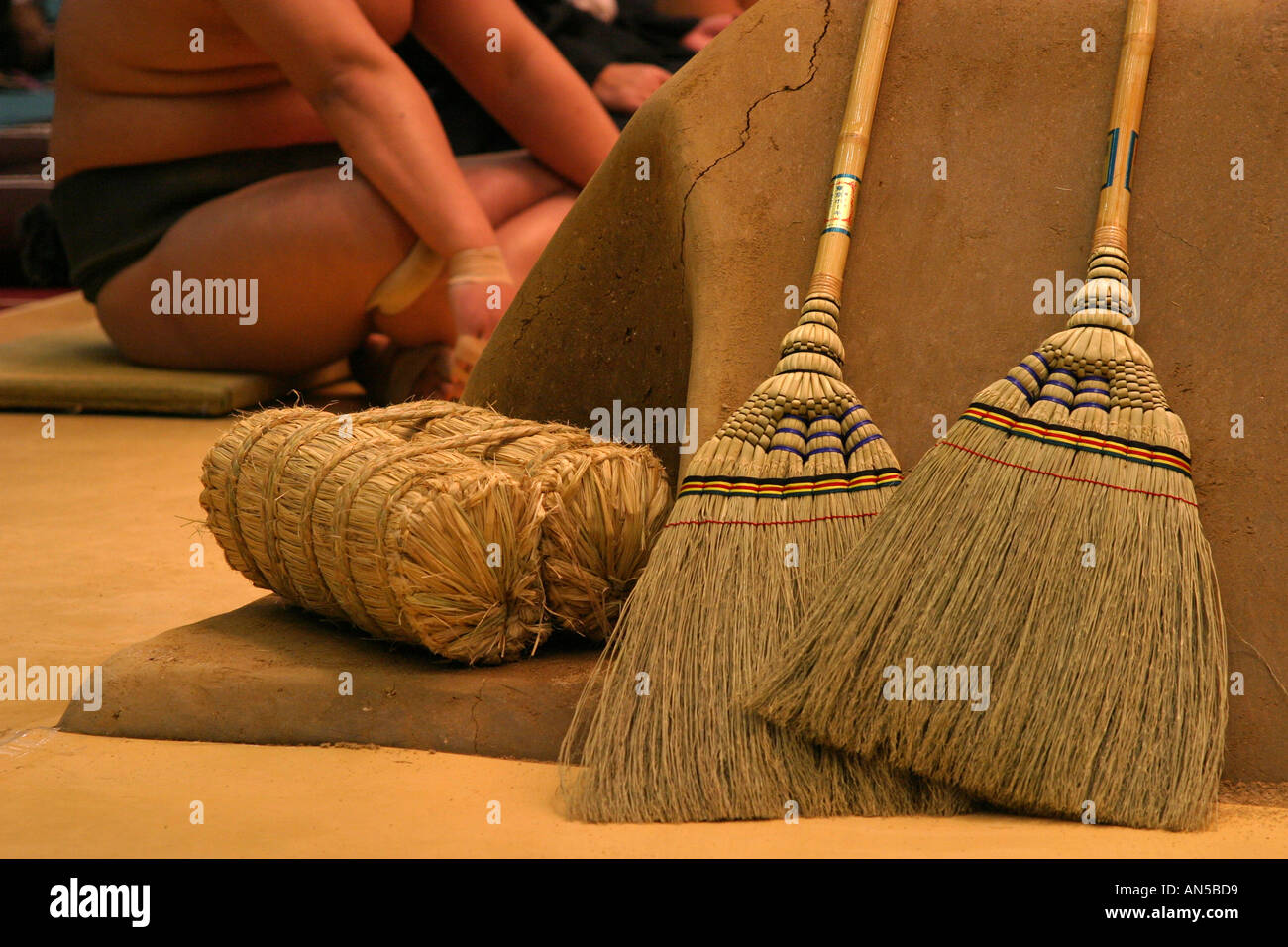 Abstract image of a Sumo wrestler sitting behind the corner of a clay ...
