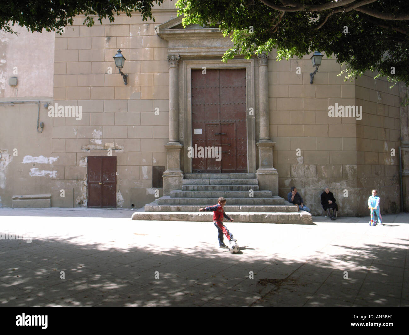 kids playing soccer in palermo Stock Photo - Alamy